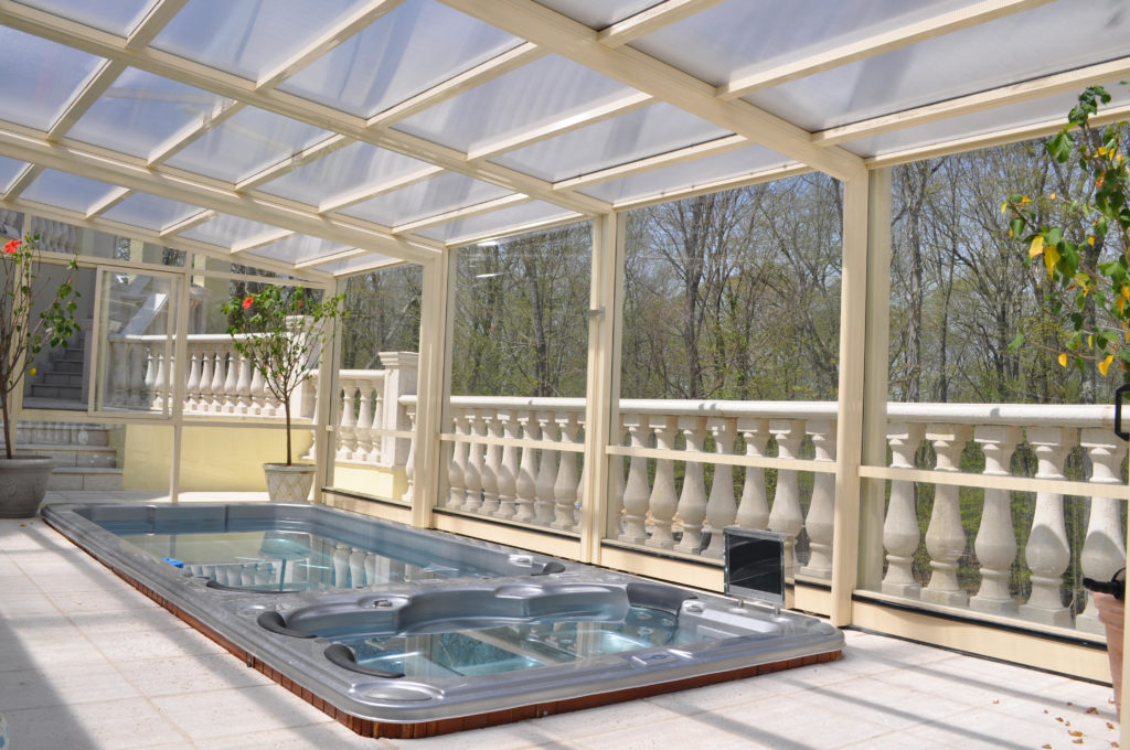 Retractable Pool Enclosures Manufactured by Roll-A-CoverAmerica's ...