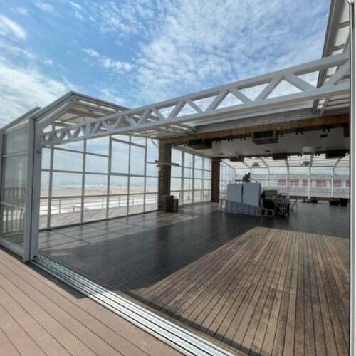 Sunny Atlantic Beach Club Retractable Enclosure by Roll-A-CoverAmerica ...