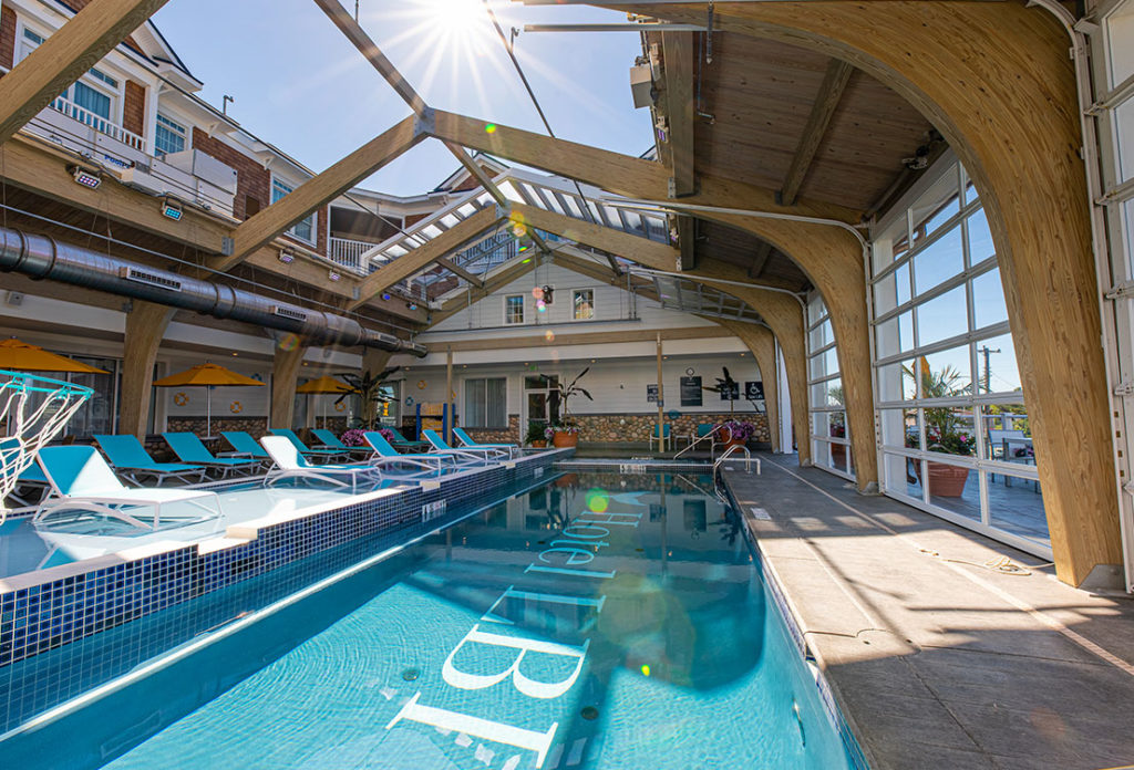 Retractable Pool Enclosures Manufactured by Roll-A-CoverAmerica's ...