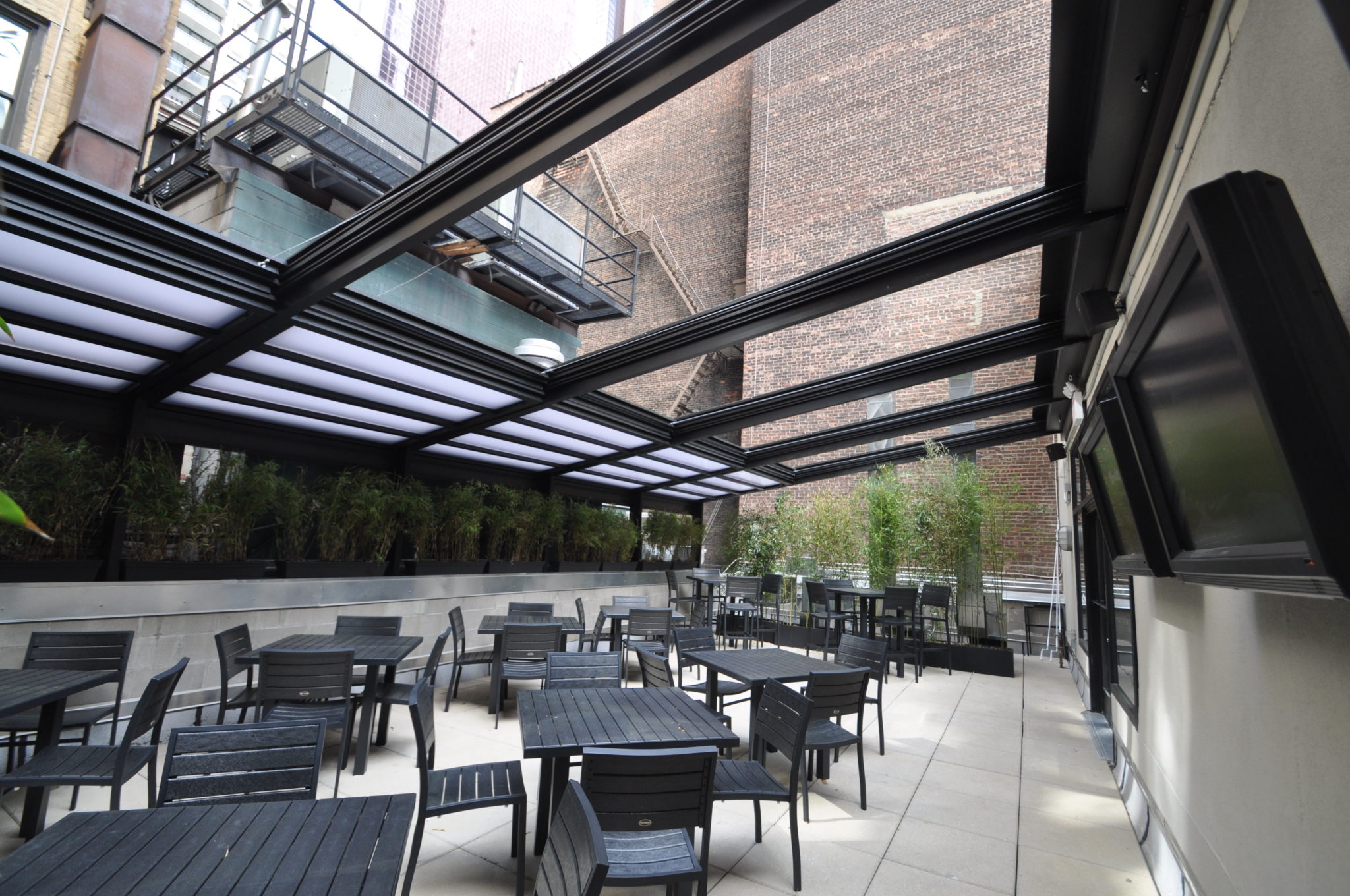 Restaurant Chains with Roll-A-Cover Retractable Roof EnclosuresAmerica ...