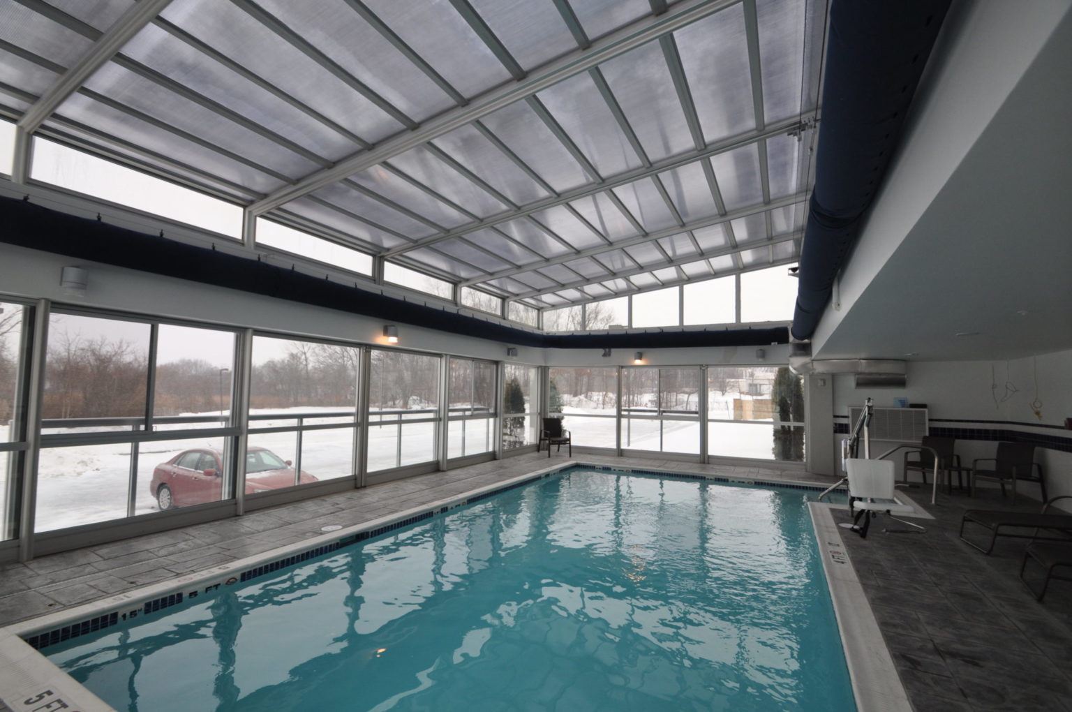 Glass Pool Enclosure Benefits Manufactured by Roll-A-CoverAmerica's ...