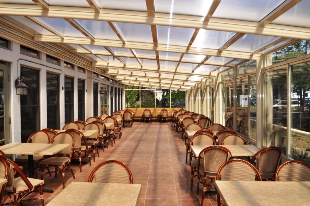 Restaurant Retractable Patio Cover Manufactured by Roll-A-CoverAmerica ...